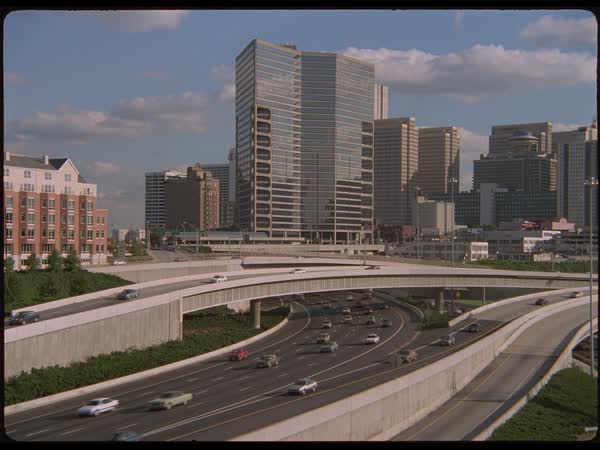 Traffic on the freeway and downtown Atlanta buildings in the background ...