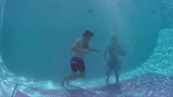 Hand-held shot view of two men holding breath underwater - HD Rights ...