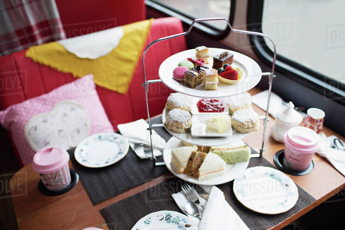 Table set for afternoon tea in café - Stock Photo - Dissolve