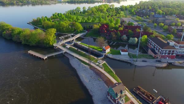 Beautiful morning aerial flyover of De Pere Wisconsin waterfront area ...