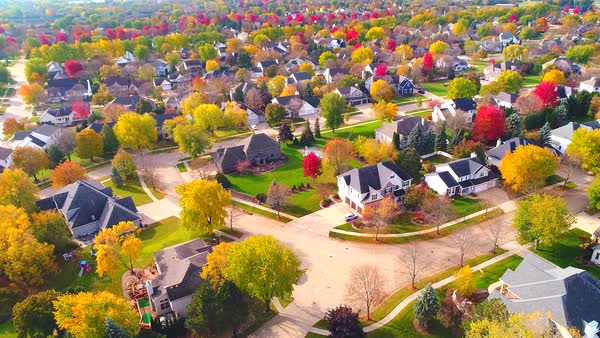 Beautiful neighborhoods, homes, amid breathtaking Autumn colors, aerial ...