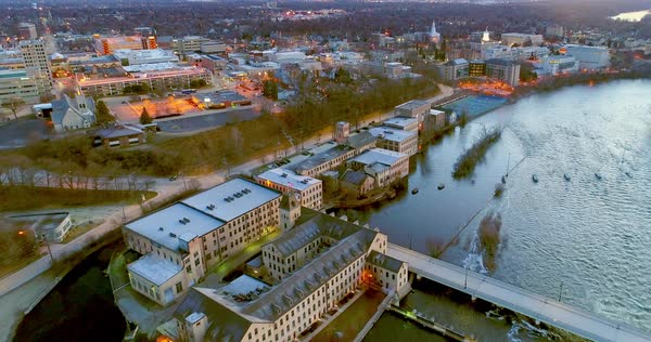 Stunning twilight aerial view of illuminated waterfront buildings in ...