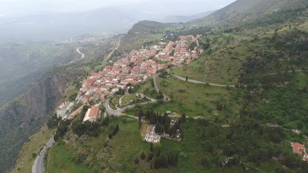 Aerial view of modern Delphi town, near archaeological site of ancient ...
