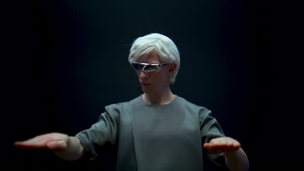 Vr guy exploring augmented reality closeup. Focused gamer in futuristic ...