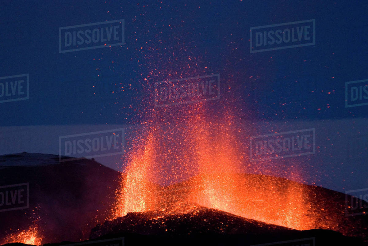 Fountaining lava Eyjafjallajokull volcano, flowing down newly-built ...