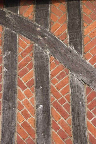 Diagonally oriented bricks and half-timbered frame detail - Royalty ...