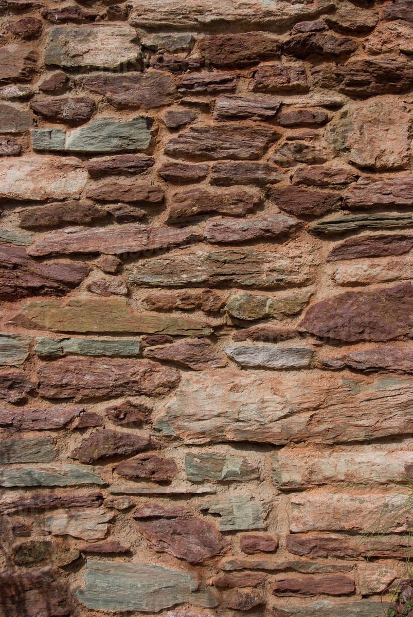 Red stone wall - Royalty-free Stock Photo | Dissolve