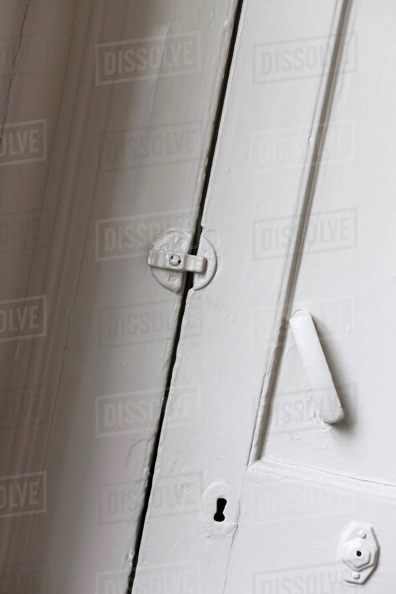 Painted door latch - Royalty-free Stock Photo | Dissolve