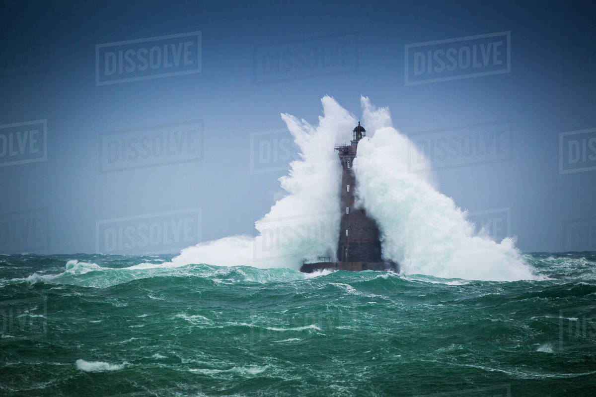 Waves lashing the Four Lighthouse during winter storm, Northern ...