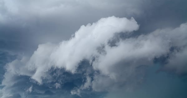 Ghost-like white and blue clouds swirl ahead of approaching storm, real ...