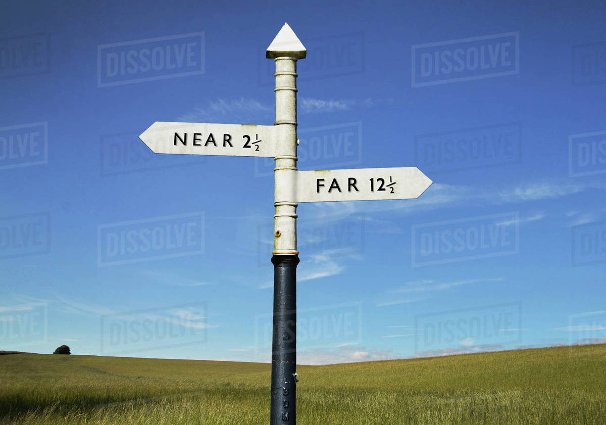 Old Country Sign Post with Near and Far as Destinations - Stock Photo ...