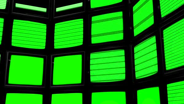 A Curved Array of Screens Displaying Green Screen Static in the Dark ...