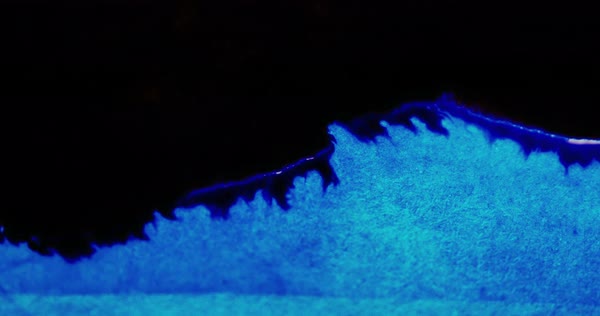 Dark red bleeding into light blue colors. Abstract colorful background ...