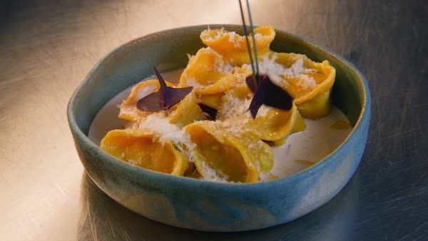 Chef cook makes presentation of ravioli dish - 4K Royalty-free Stock ...