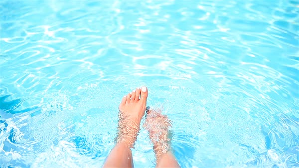 Splash in outdoor swimming pool - Stock Video Footage - Dissolve