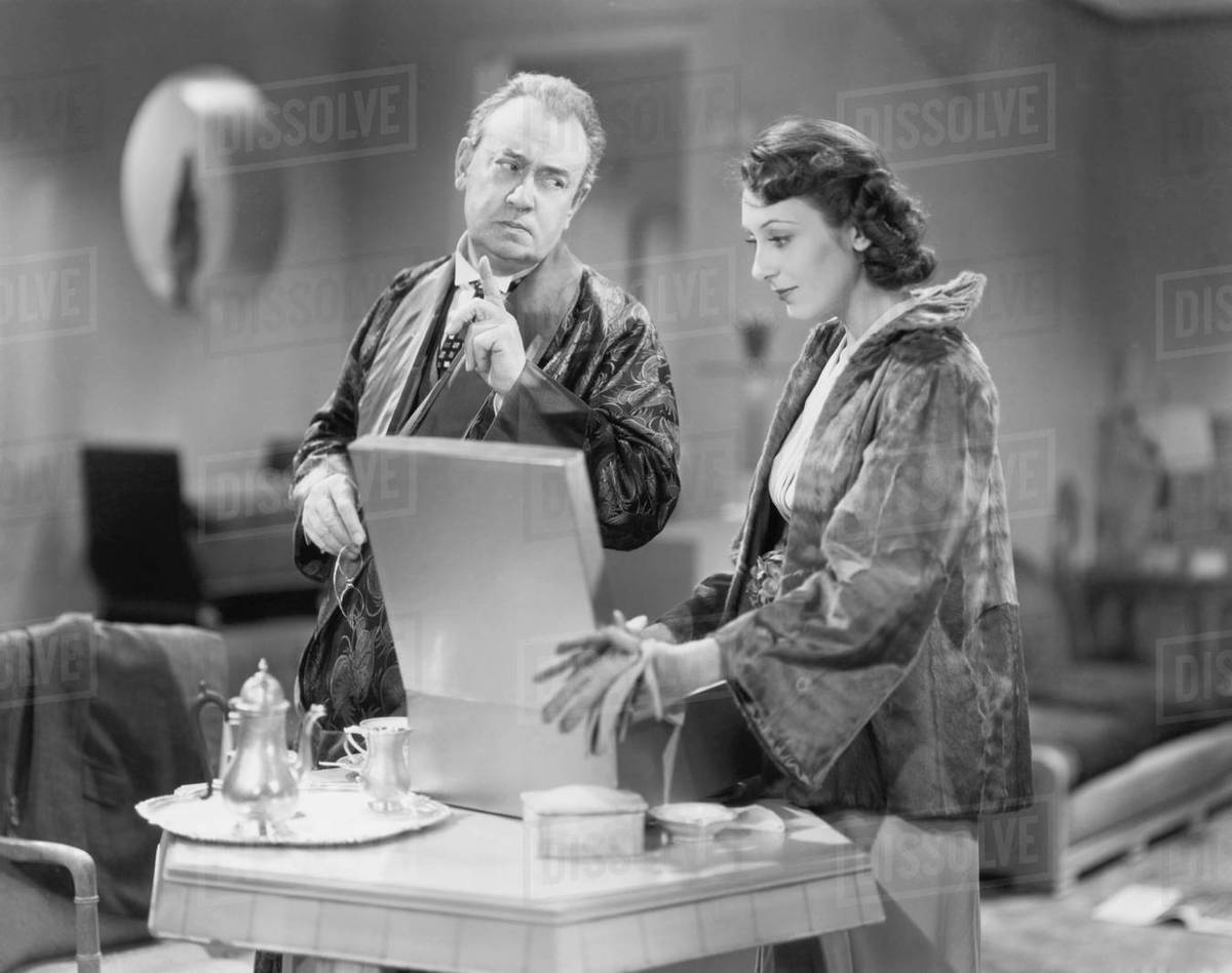 Man giving warning to woman - Stock Photo - Dissolve