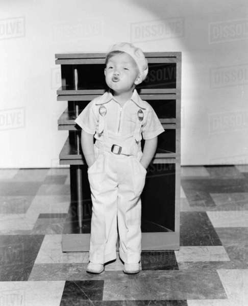 Little boy whistling - Stock Photo - Dissolve