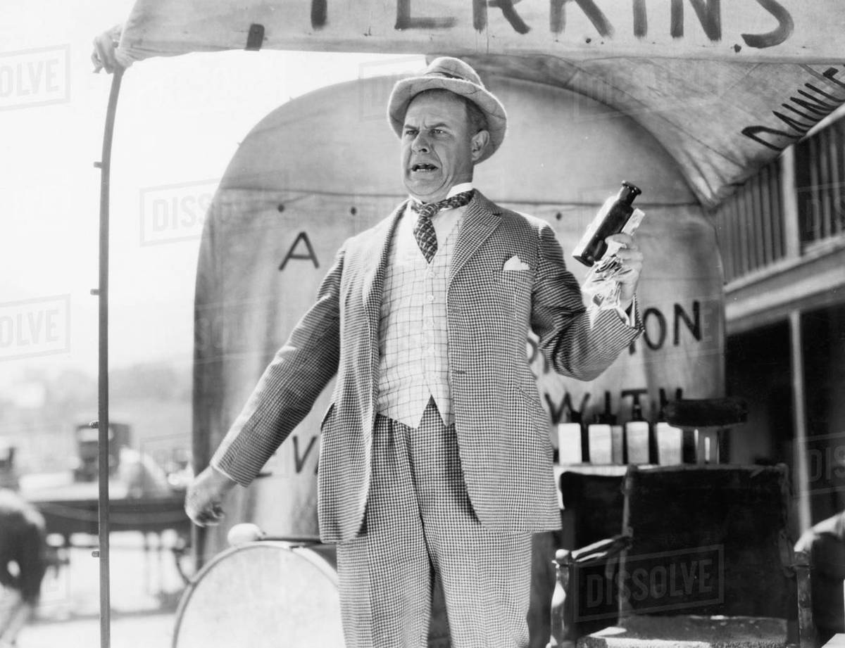 Man selling elixir - Royalty-free Stock Photo | Dissolve