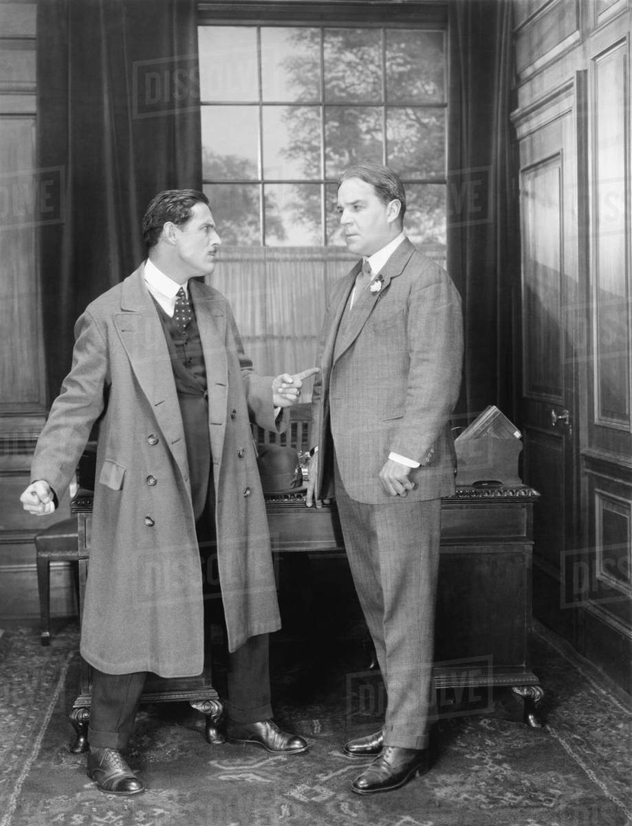 Two men arguing with each other - Royalty-free Stock Photo | Dissolve