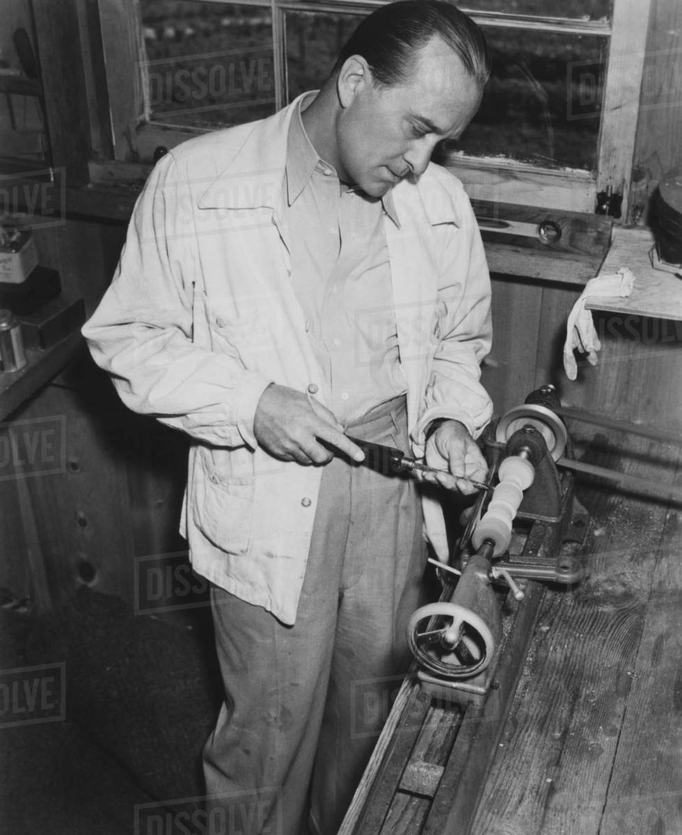 Toiling in workshop - Stock Photo - Dissolve