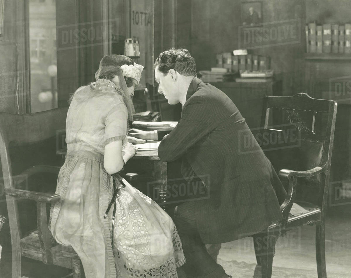 Signing papers - Stock Photo - Dissolve