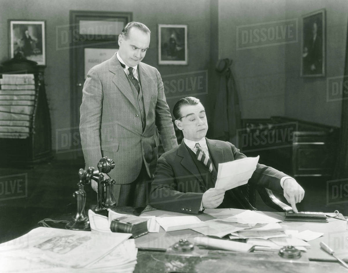 Reading over his shoulder - Royalty-free Stock Photo | Dissolve