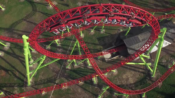 Aerial view of loop on roller coaster in amusement park - HD Royalty ...