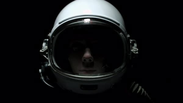 Astronaut looking into camera - 4K Royalty-free Stock Video Footage ...