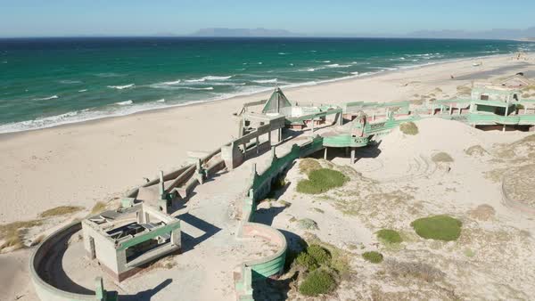 Aerial footage of the abandoned Macassar beach pavilion with a drone ...