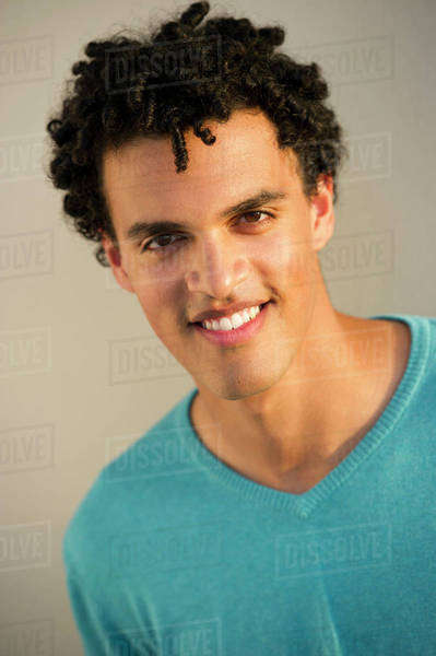 Smiling mixed race man - Royalty-free Stock Photo | Dissolve