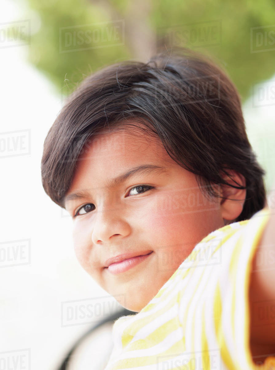 Smiling Hispanic boy - Stock Photo - Dissolve