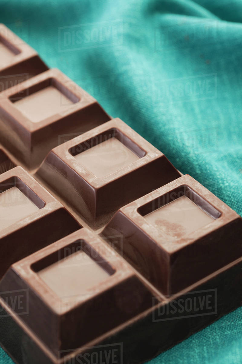 Close up of bar of chocolate - Royalty-free Stock Photo | Dissolve