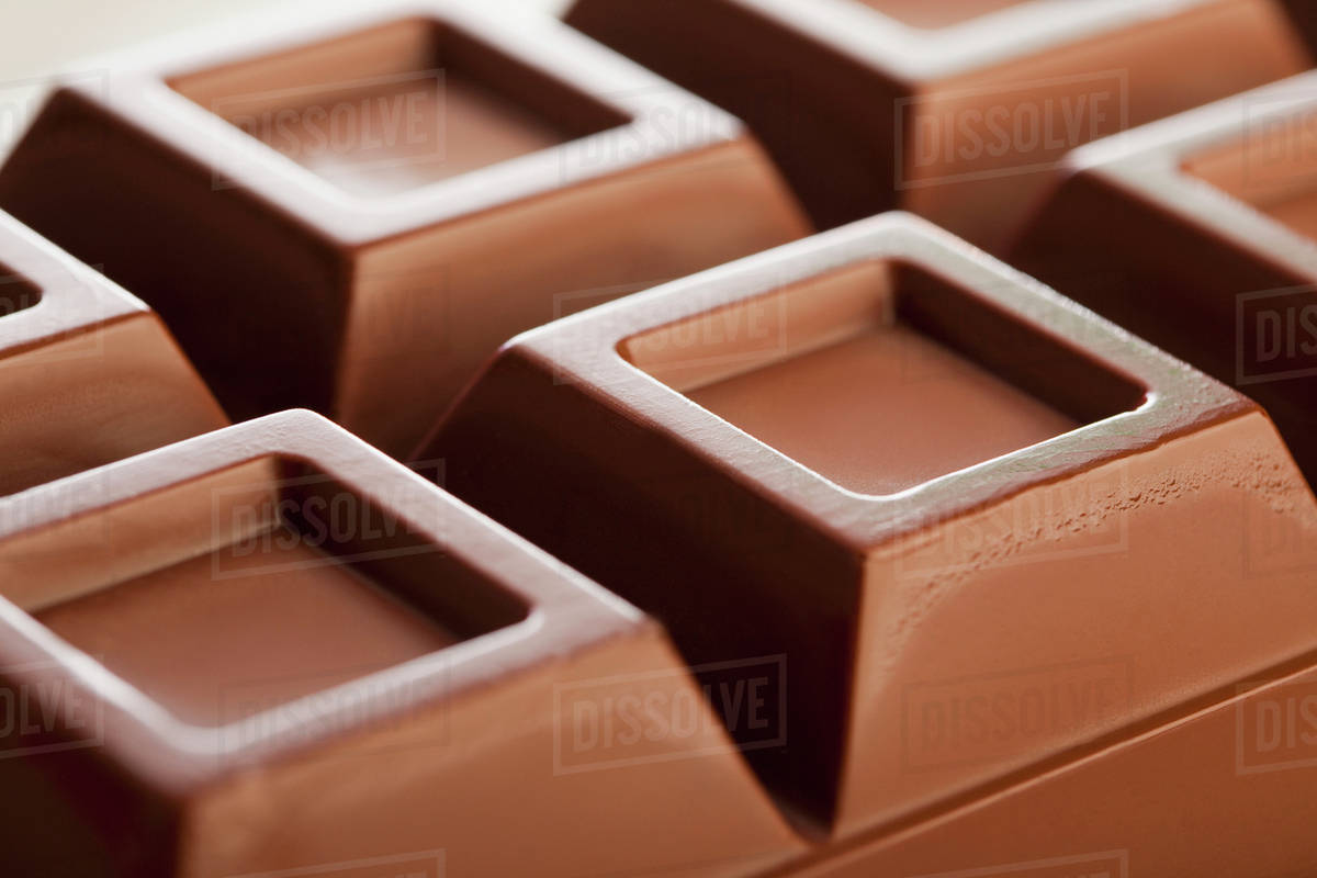 Close up of bar of chocolate - Royalty-free Stock Photo | Dissolve