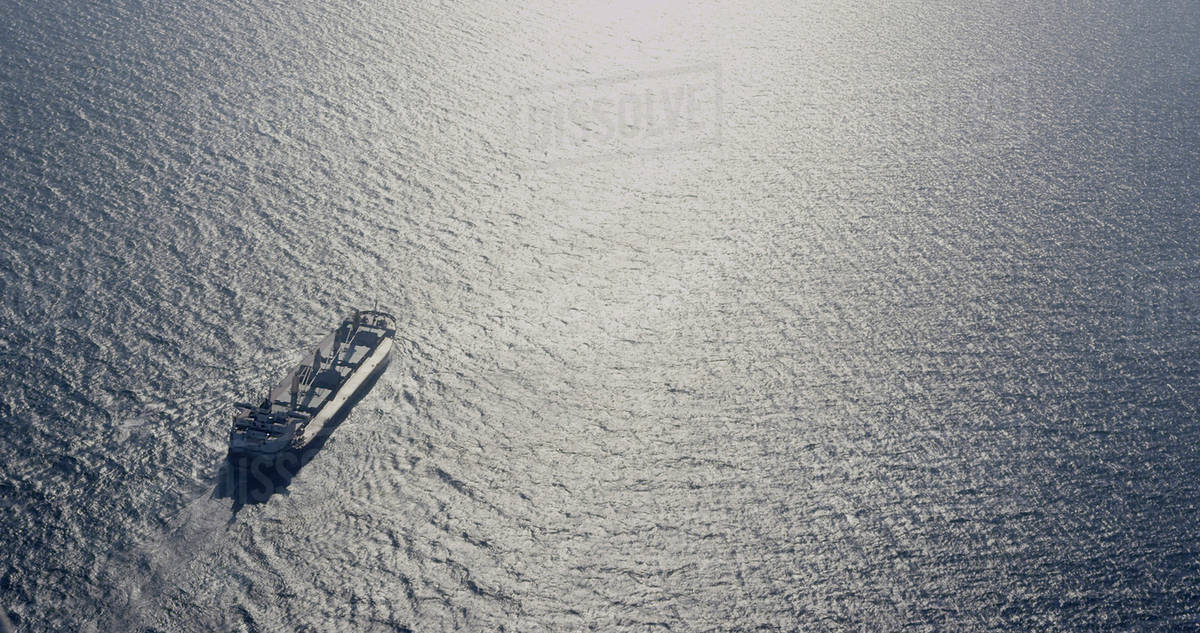 Aerial view of shipping barge in ocean - Stock Photo - Dissolve