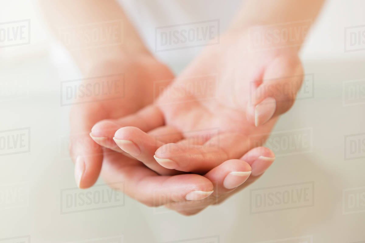 Close up of cupped hands of Hispanic woman - Royalty-free Stock Photo ...
