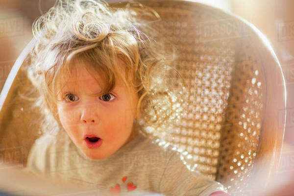 Caucasian baby boy gasping in wicker chair - Royalty-free Stock Photo ...