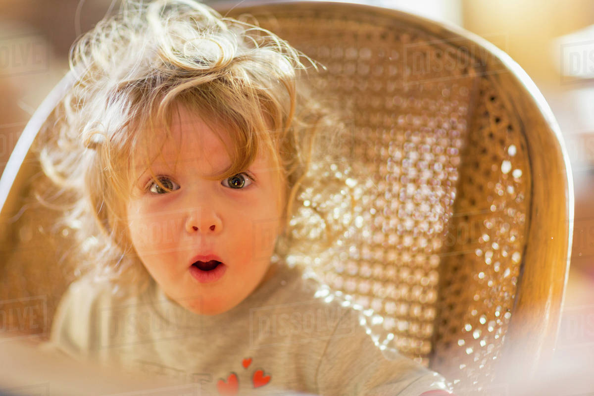 Caucasian baby boy gasping in wicker chair - Royalty-free Stock Photo ...