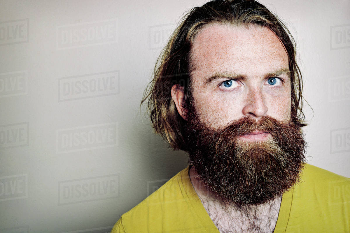 Caucasian man with serious expression - Royalty-free Stock Photo | Dissolve