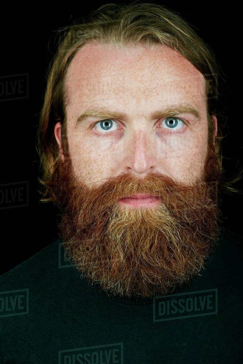 Caucasian man with serious expression - Royalty-free Stock Photo | Dissolve