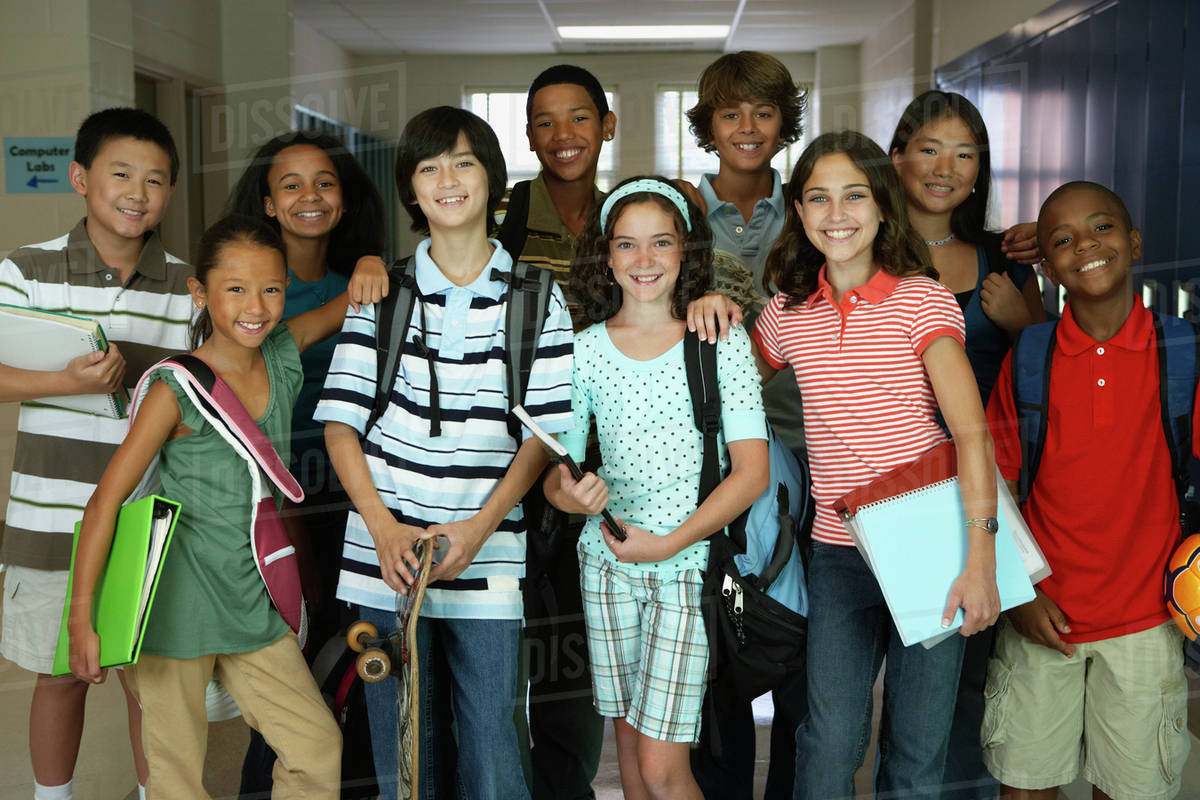 Group of multi-ethnic students in hallway - Royalty-free Stock Photo ...