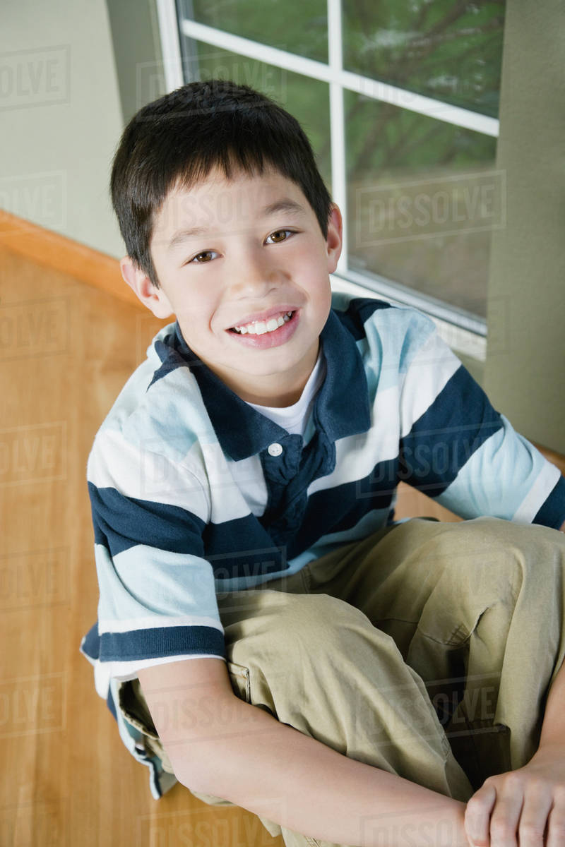Close up of Mixed Race boy smiling - Royalty-free Stock Photo | Dissolve