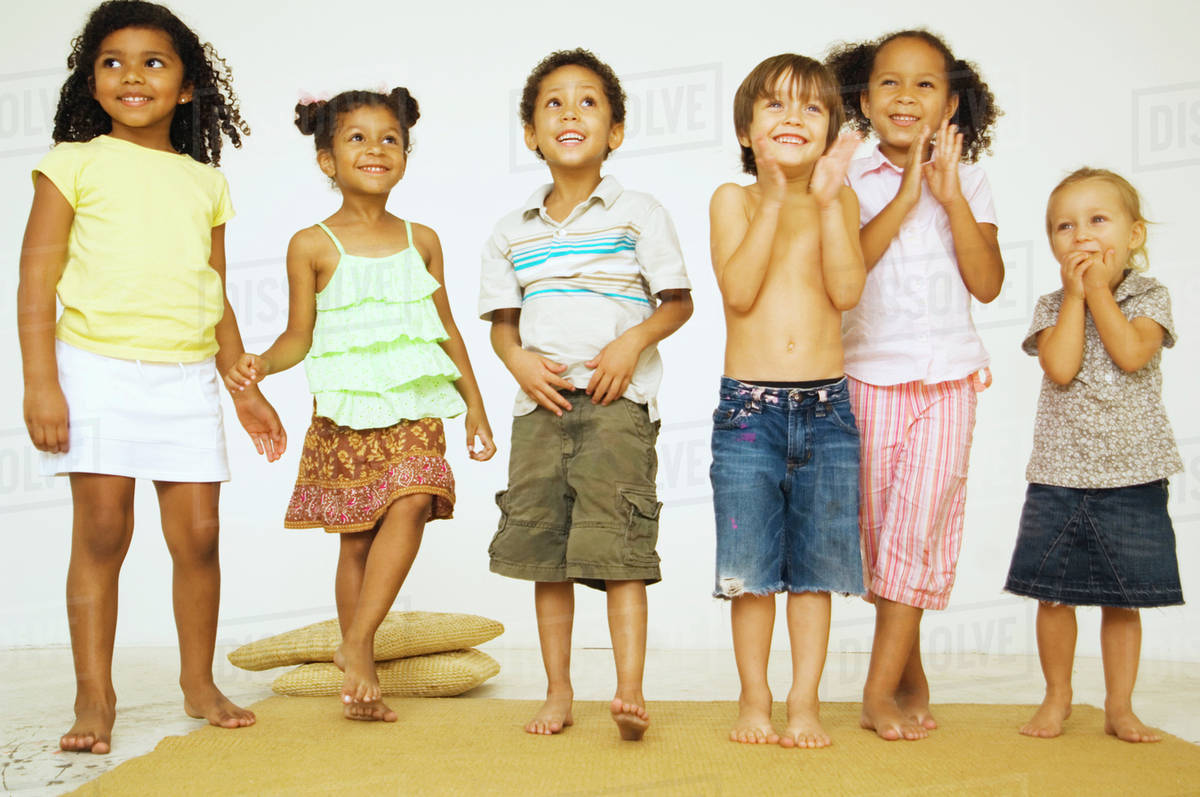 Multi-ethnic children looking excited - Royalty-free Stock Photo | Dissolve