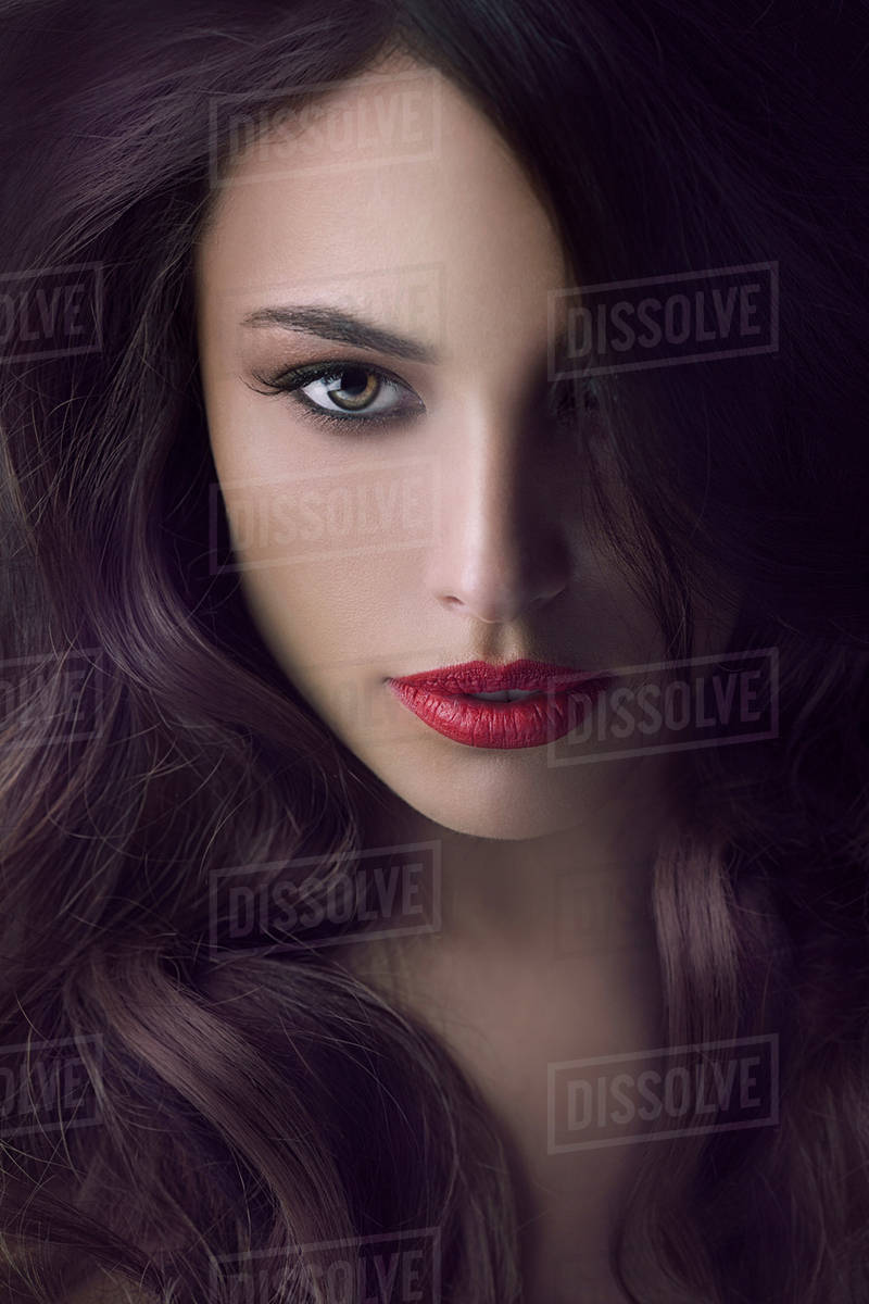 Close up of face of glamorous woman - Stock Photo - Dissolve