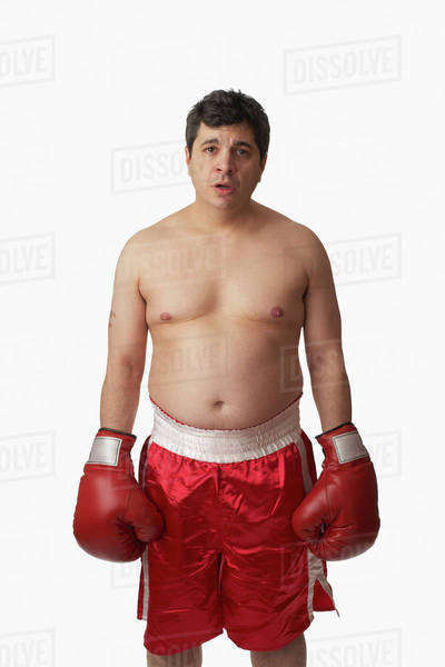 Portrait of overweight boxer - Stock Photo - Dissolve