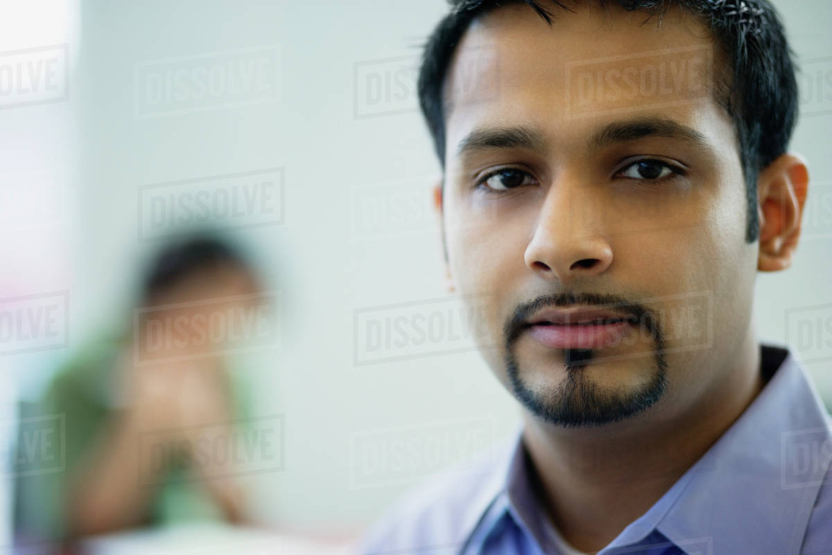 Close up of Indian businessman looking serious - Royalty-free Stock ...