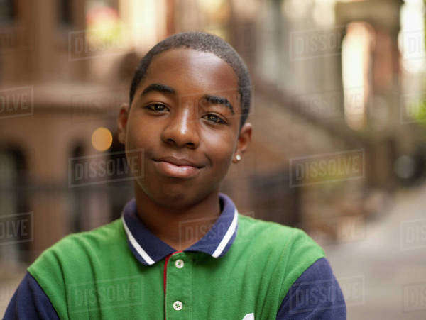 African teenage boy smiling - Royalty-free Stock Photo | Dissolve