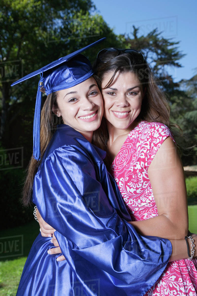 Mother hugging graduate daughter - Royalty-free Stock Photo | Dissolve