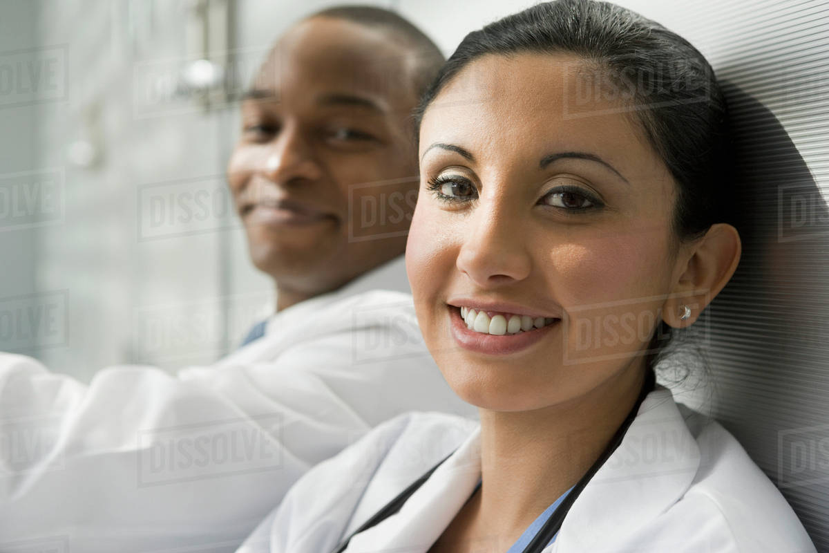 Doctors smiling - Royalty-free Stock Photo | Dissolve