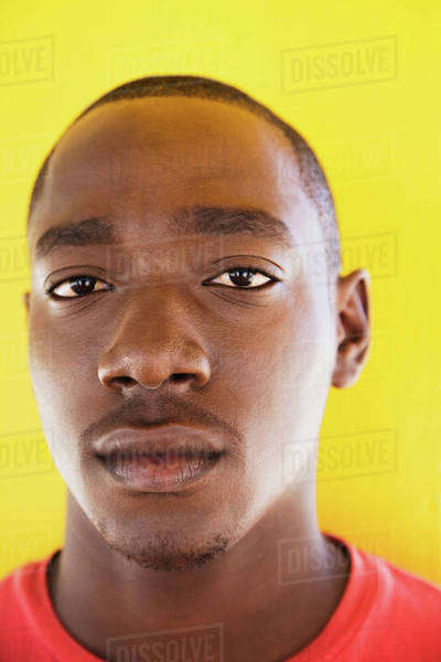 Close up of serious African man - Royalty-free Stock Photo | Dissolve