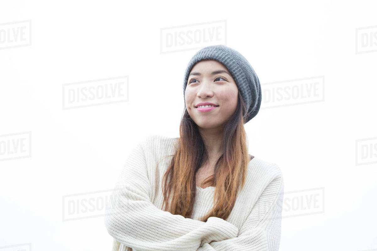 Japanese woman with arms crossed - Royalty-free Stock Photo | Dissolve